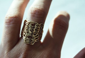 Kenzo’s gold tiger – AND A THOUSAND WORDS